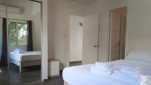 Apartamento, 2 quartos | Ferro/tábua de engomar, Wi-fi grátis, com decoração personalizada 