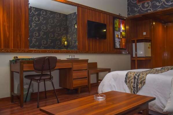 Quarto Executivo, 2 quartos, Vista para a cidade | Comodidade do quarto