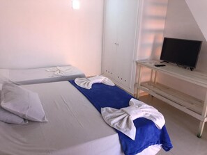 Minibar, roupa de cama fornecida