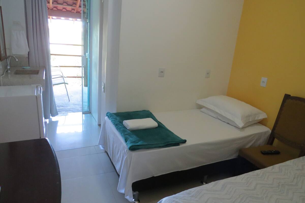 Suite, vista para o jardim | Minibar, Wi-fi grátis, roupa de cama fornecida