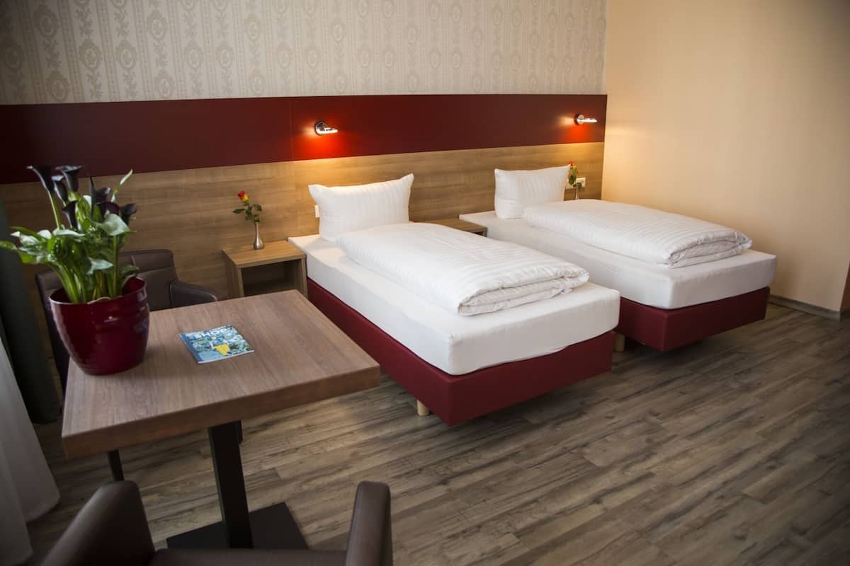 Quarto Triplo | Secretária, quartos insonorizados, Wi-fi grátis 