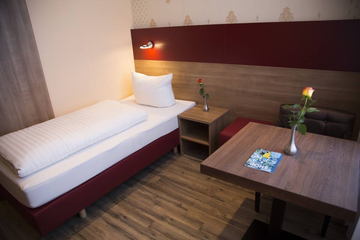 Quarto Individual | Secretária, quartos insonorizados, Wi-fi grátis 