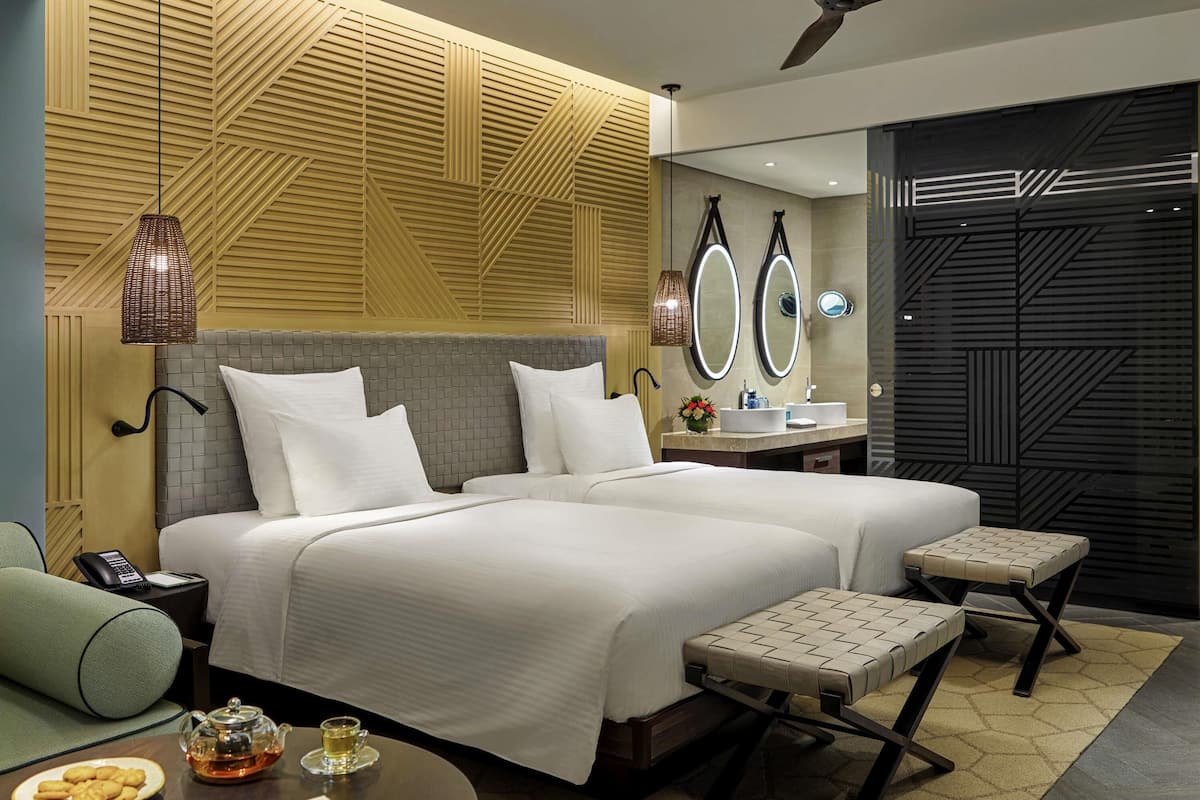 Roupas de cama antialérgicas, frigobar, cofres nos quartos