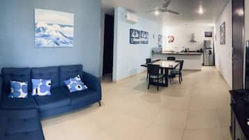 Apartamento luxo | Área de estar | TV de tela plana