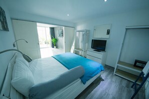 Apartamento superluxo | Roupas de cama premium, frigobar, individualmente decorados