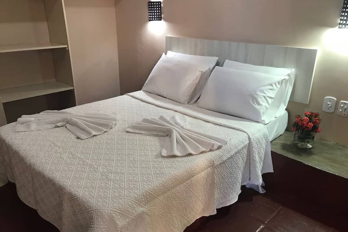 Minibar, ferro/tábua de engomar, Wi-fi grátis, roupa de cama fornecida