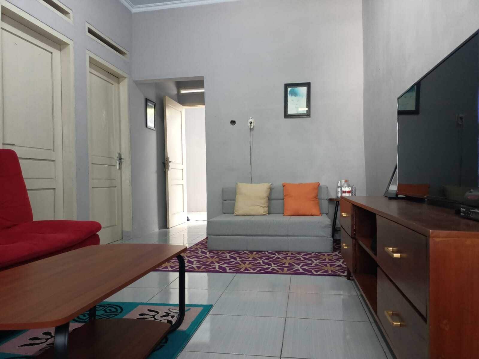 Casa Standard, 2 quartos | Sala de estar | TV de ecrã plano 