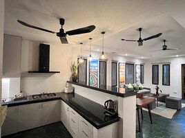 Suite Familiar | Cozinha privada | Uma chaleira elétrica