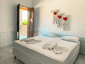 Quarto Quádruplo Familiar | Minibar, Wi-fi grátis, roupa de cama fornecida