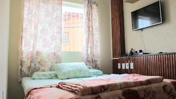 Quarto Quádruplo | Minibar, quartos insonorizados, Wi-fi grátis, roupa de cama fornecida
