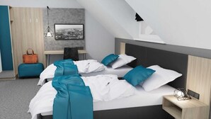 Quarto moderno com cama, mesas de cabeceira, escrivaninha e luminária pendente.
