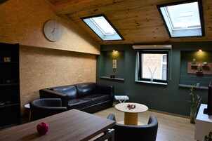 Apartamento | Área de estar | TV de tela plana