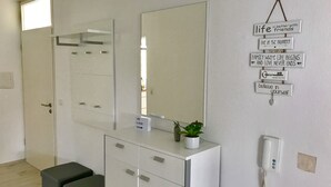 Apartamento conforto, 3 quartos | Área de estar