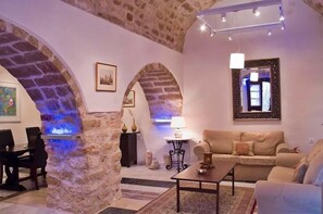 Suite, vista para o mar | Sala de estar