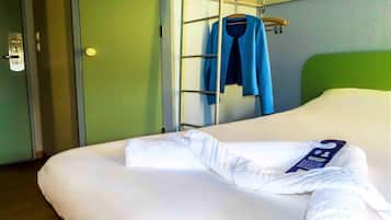 Quartos à prova de som, Wi-Fi de cortesia, roupa de cama