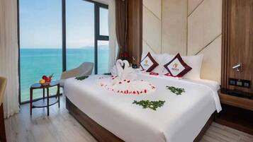 Quarto luxo, vista para o mar | Frigobar, cofres nos quartos, escrivaninha, Wi-Fi de cortesia