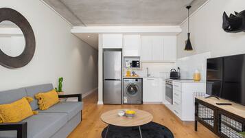 Apartamento conforto | Área de estar | TV de tela plana, Netflix, serviços de streaming