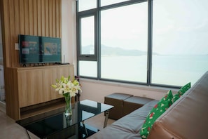 Apartamento superluxo, 2 quartos, cozinha americana, vista para a praia | Vista para praia/oceano
