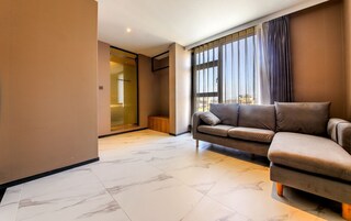 Signature Royal Suite | Sala de estar | TV de ecrã plano 