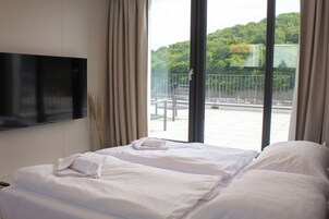 Apartamento Superior, Vista para a cidade | Wi-fi grátis, roupa de cama fornecida 
