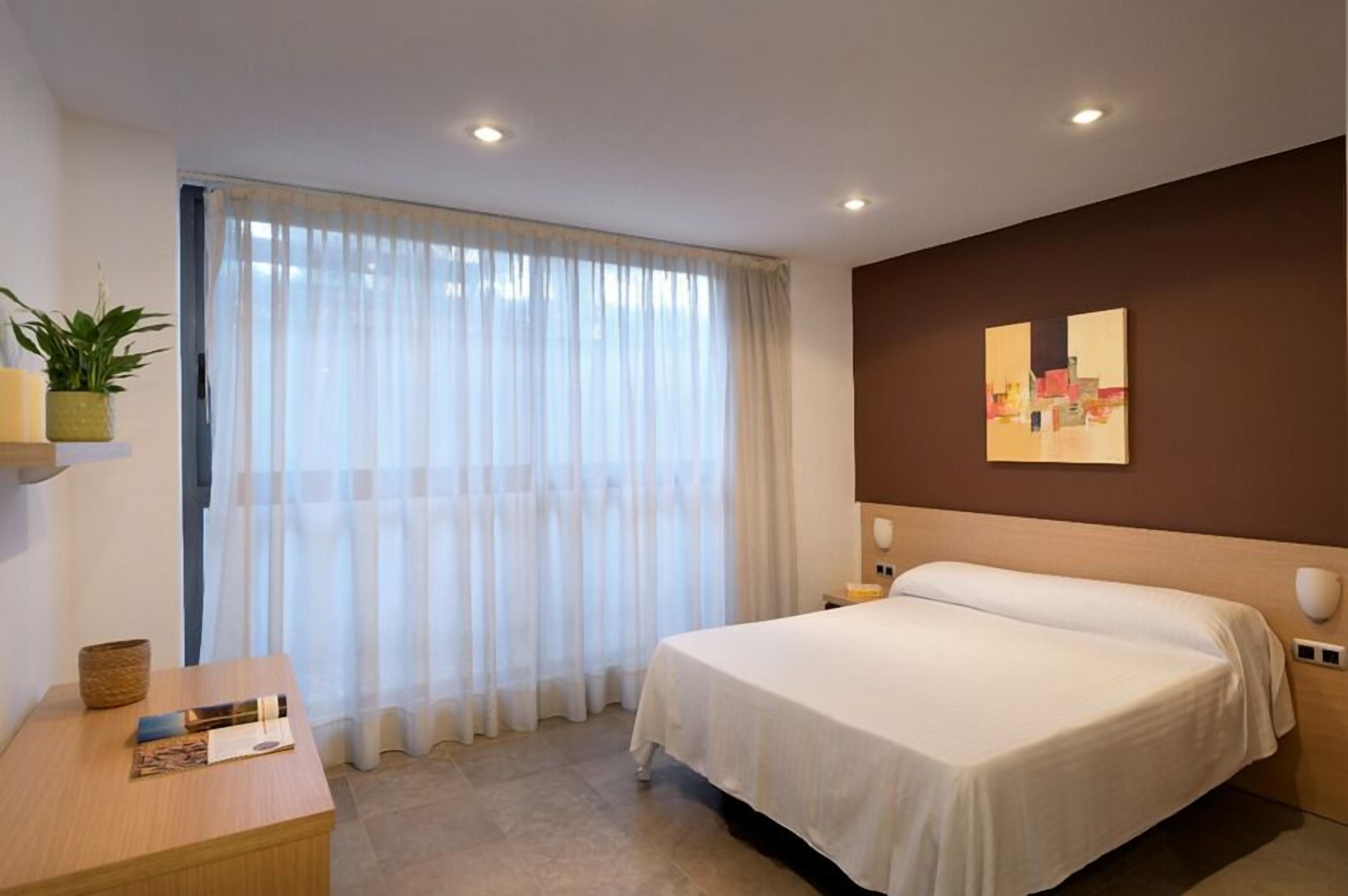 Dúplex, 2 quartos (4 people) | Cortinas/cortinados opacos, quartos insonorizados, Wi-fi grátis 