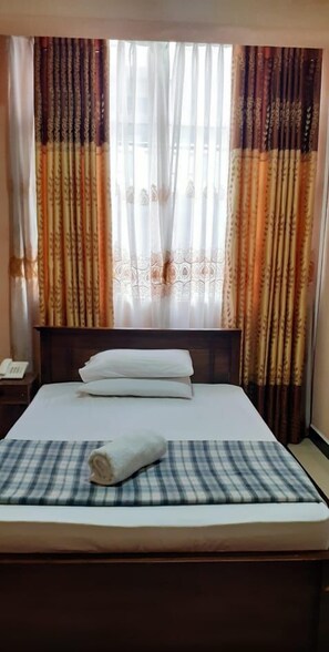 Quarto standard | 1 quarto, ferros/tábuas de passar roupa, roupa de cama