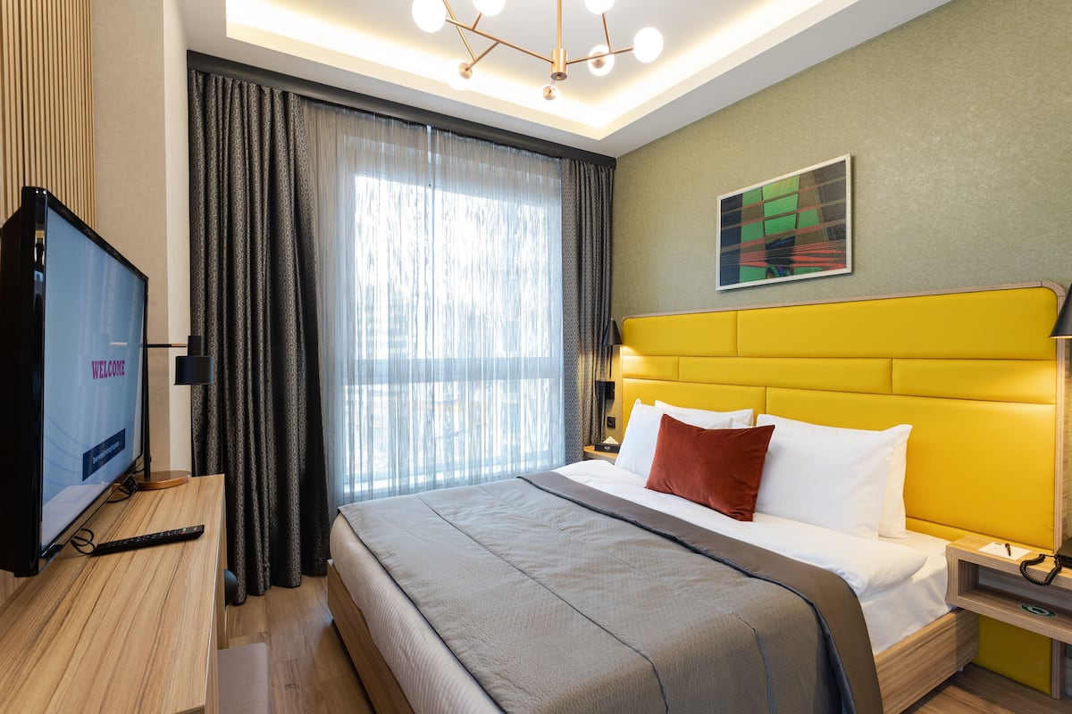 Roupa de alta qualidade, minibar, cofre no quarto