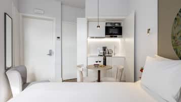 Estúdio | Cofres nos quartos, ferros/tábuas de passar roupa, berços (sobretaxa)