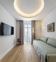 Apartamento Superior, 1 quarto | Sala | TV de ecrã plano 