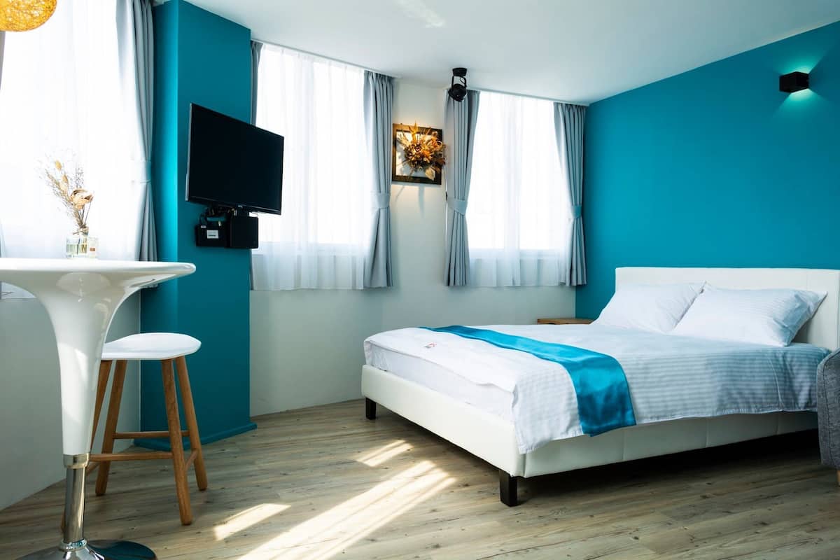 Quarto Duplo de Luxo | Secretária, cortinas/cortinados opacos, quartos insonorizados