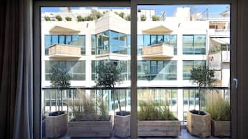 Apartamento Deluxe, 4 quartos, varanda | Vista do quarto