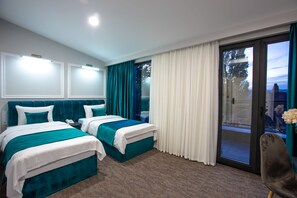 Roupa de alta qualidade, minibar, secretária, quartos insonorizados 