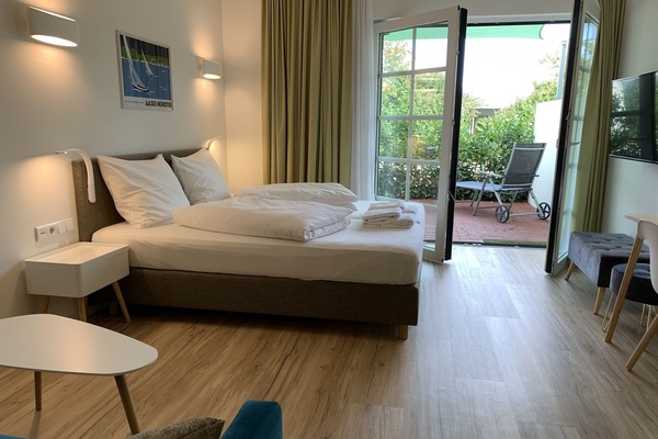 Quarto Duplo Júnior, 1 quarto, acessível, pátio | Vista para o pátio