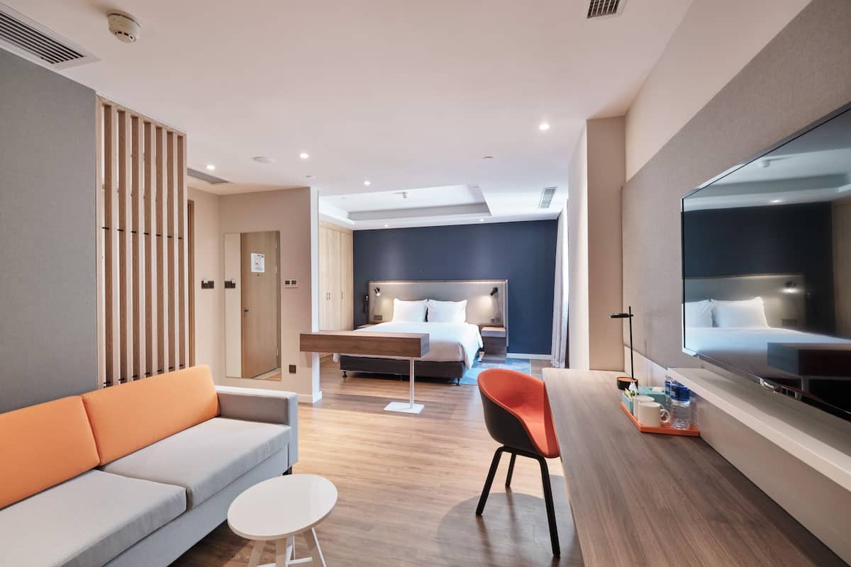 Suíte, 1 cama King | Cofres nos quartos, quartos à prova de som