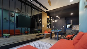 Apartamento Elite | Sala de estar | Televisor de ecrã plano de 50 polegadas com canais digitais, televisor 