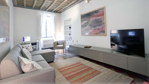 Apartamento, 1 cama Queen e sofá-cama | Sala de estar | Smart TV