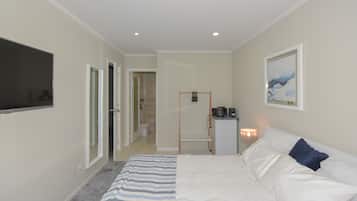 Quarto casal luxo | 1 quarto, individualmente mobiliados, cortinas blackout