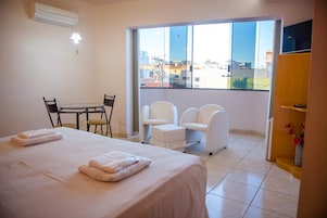 Quarto superluxo | Frigobar, Wi-Fi de cortesia, roupa de cama