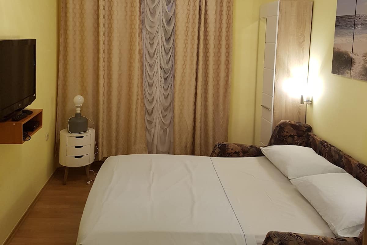 Apartamento, 1 quarto (4 Adults) | Sala | TV de ecrã plano