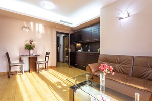 Apartamento Familiar | Sala de estar | TV de ecrã plano