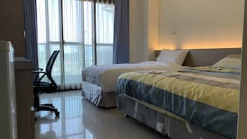 Quarto Triplo Familiar | Secretária, cortinas/cortinados opacos, Wi-fi grátis