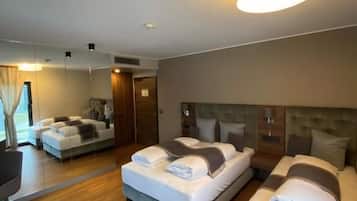 Quarto triplo conforto | Roupas de cama premium, edredons de pluma, camas Select Comfort