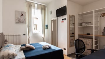 Quarto Duplo Cidade | 1 quarto, roupa de alta qualidade, camas de colchão viscoelástico