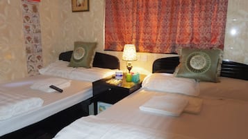 Quarto triplo | Cofres nos quartos, Wi-Fi de cortesia, acesso para cadeiras de rodas