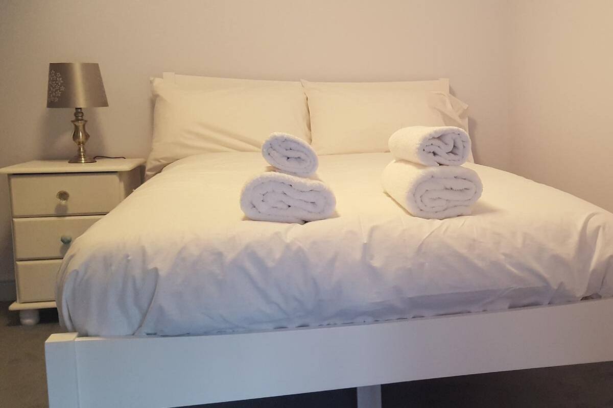 Cortinas blackout, Wi-Fi de cortesia, roupa de cama