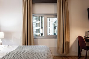 Atrium Small | Vista para o pátio