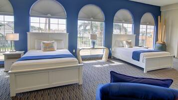 Deluxe Suite | Cortinas blackout, ferros/tábuas de passar roupa, Wi-Fi de cortesia