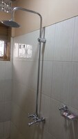 Quarto Individual Deluxe | Duche na casa de banho