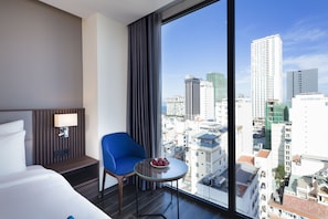 Quarto triplo luxo, vista para a cidade | Vista da sacada