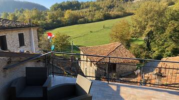 Quarto casal panorâmico, suíte | Terraço/pátio